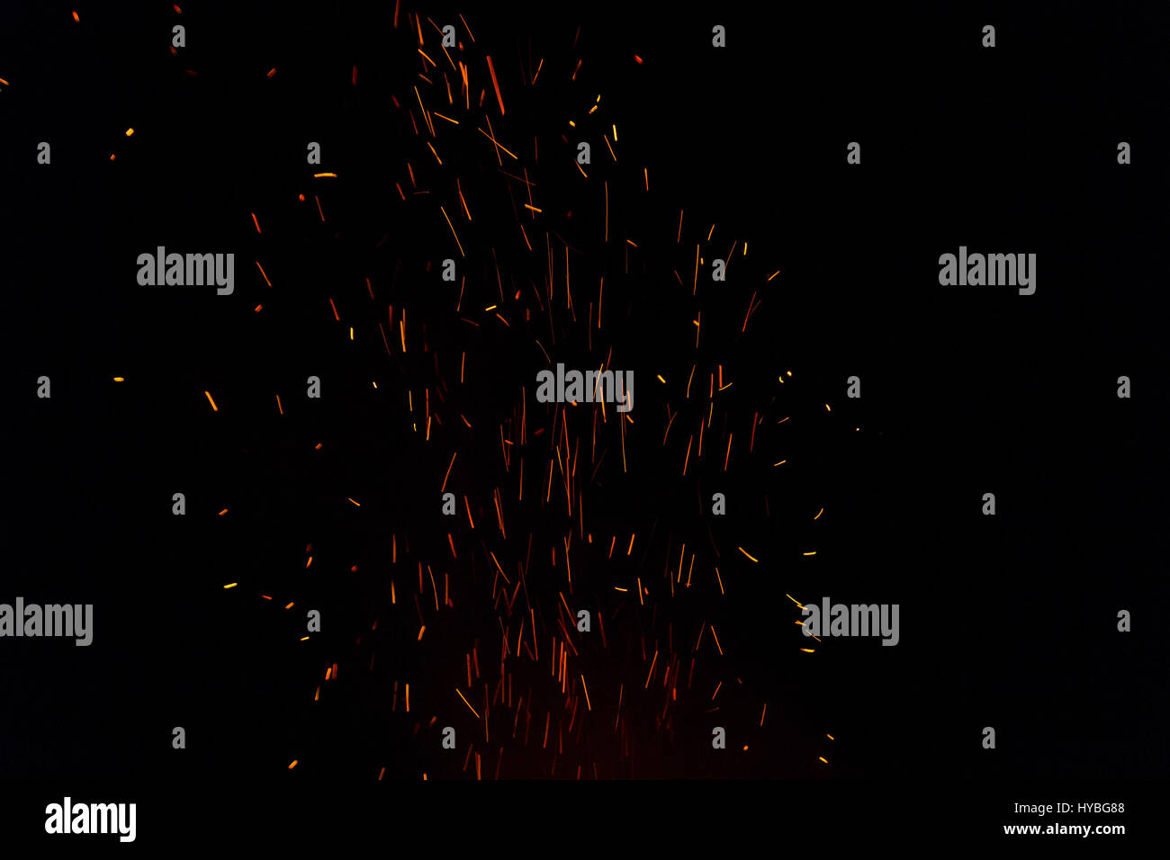 Photo of hot sparking live-coals burning, spark of bonfire Stock Photo ...