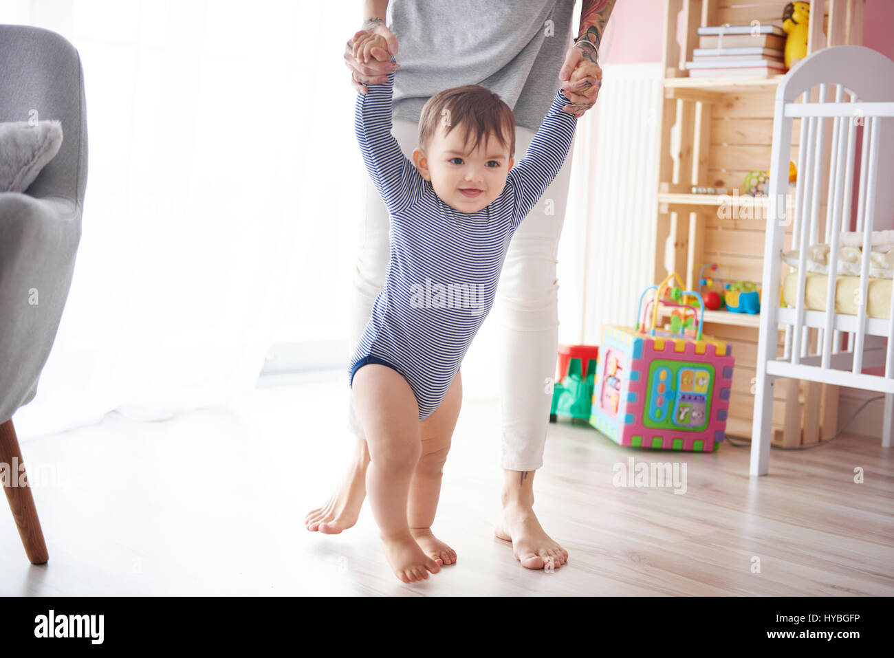 Baby Taking Its First Steps High Resolution Stock Photography and ...