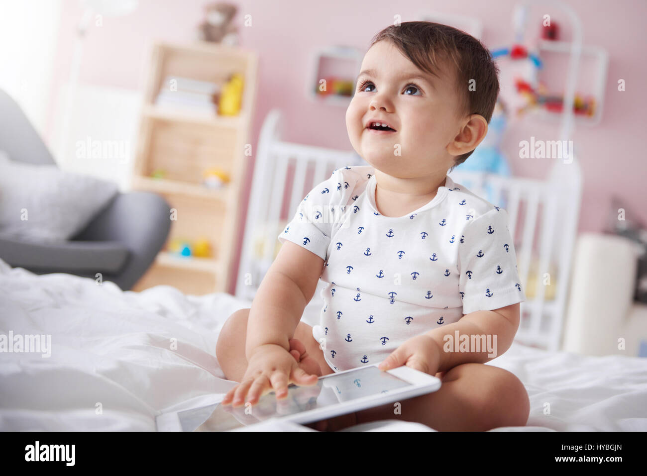 Little toddler using digital tablet Stock Photo - Alamy