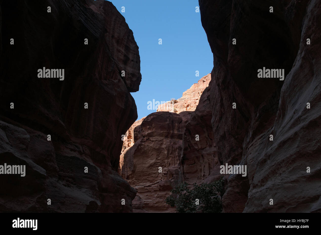 Jordan: different shapes, colors and shades of the red rocks walking in ...