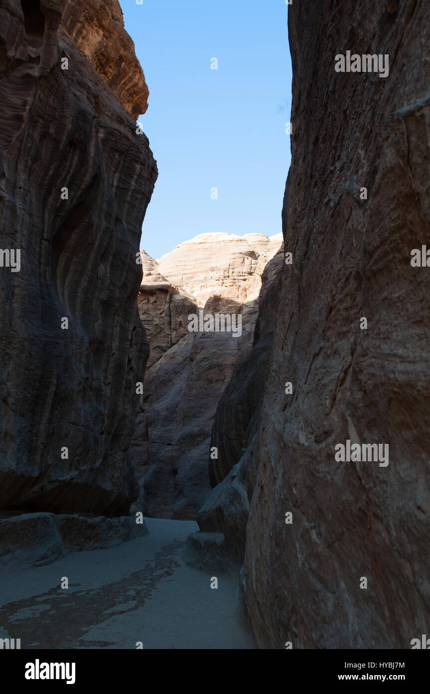 Jordan: different shapes, colors and shades of the red rocks walking in ...