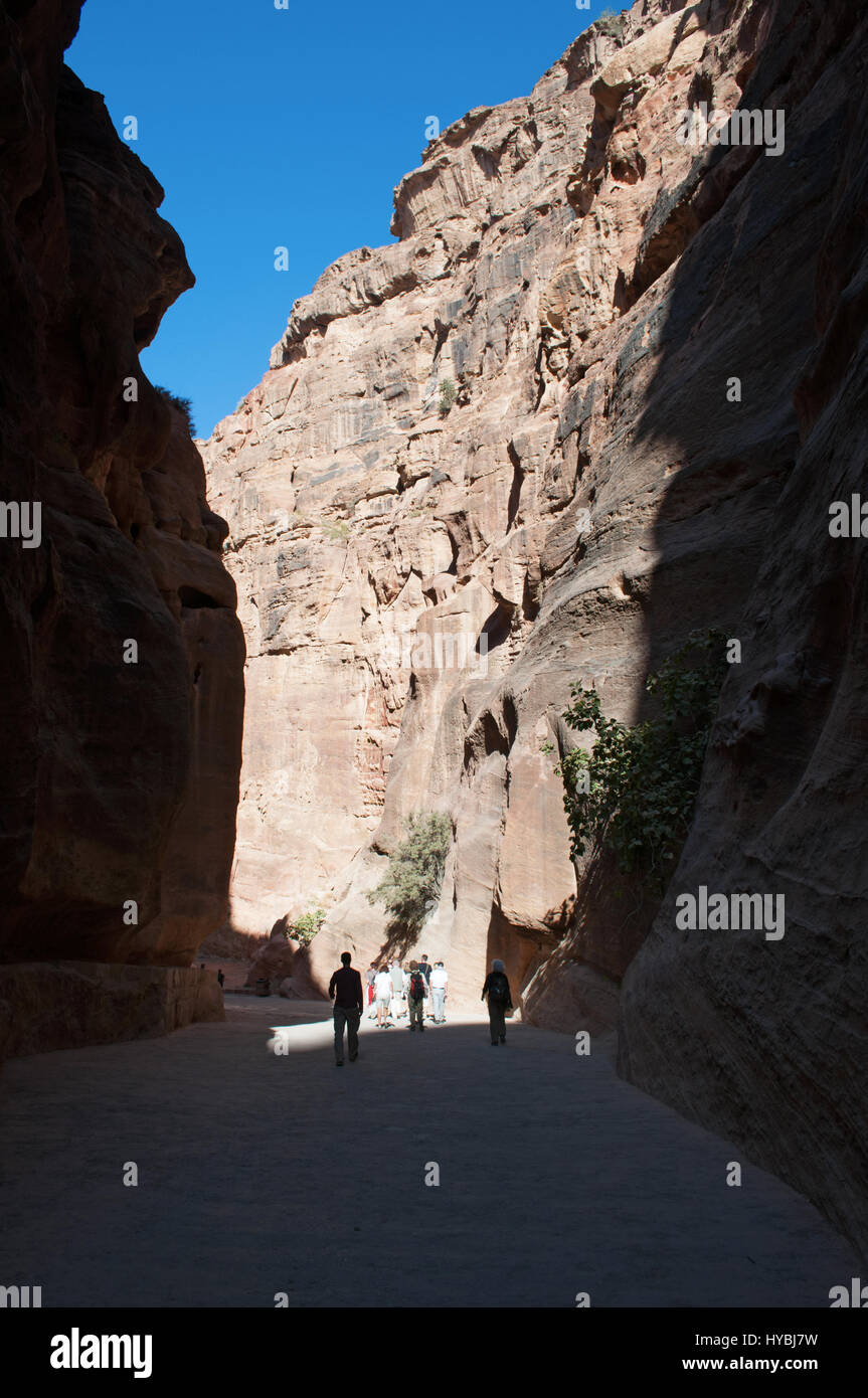 Jordan: different shapes, colors and shades of the red rocks walking in ...