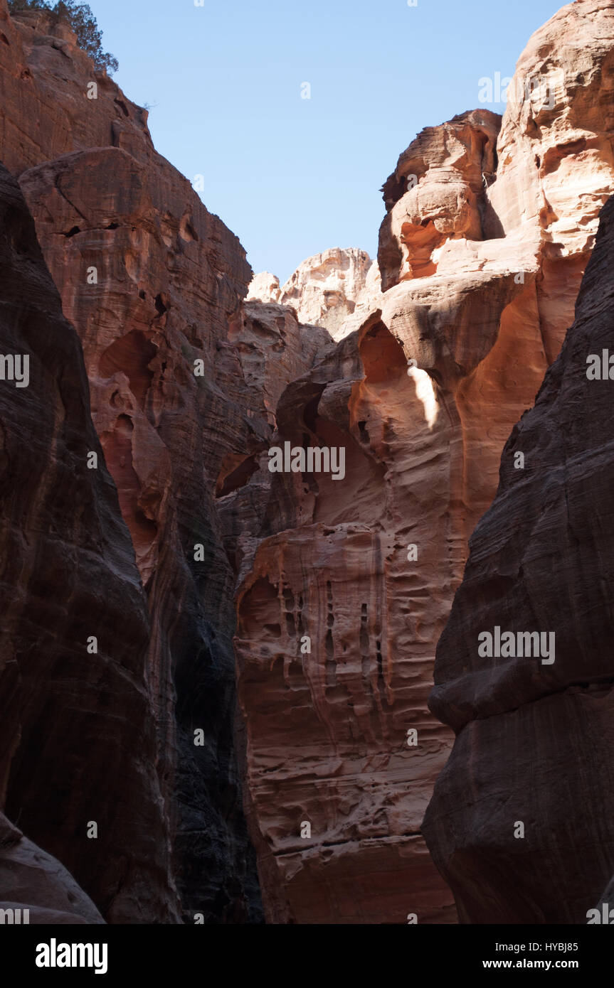 Jordan: different shapes, colors and shades of the red rocks walking in ...