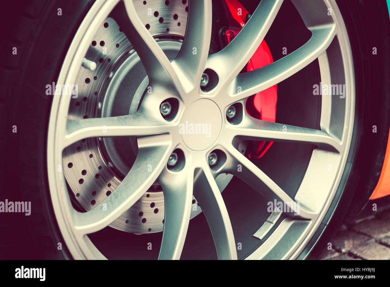 Close up of a modern sport wheel with vintage effect Stock Photo - Alamy