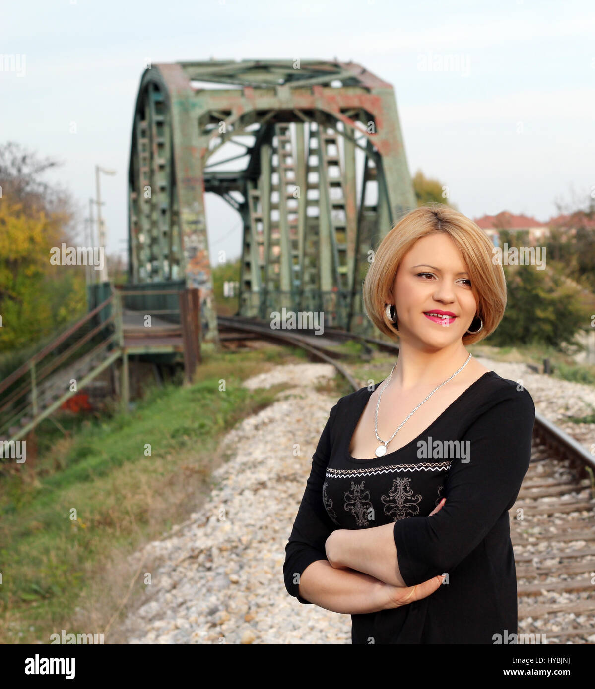 beautiful woman on railroad portrait Stock Photo - Alamy