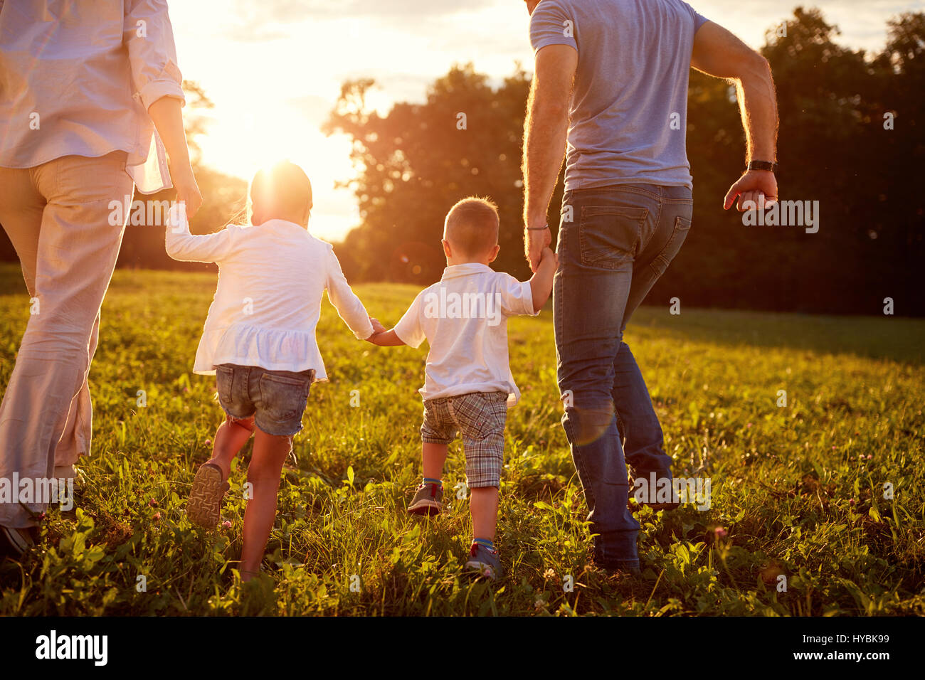Family together, parents with children back view - concept Stock Photo ...