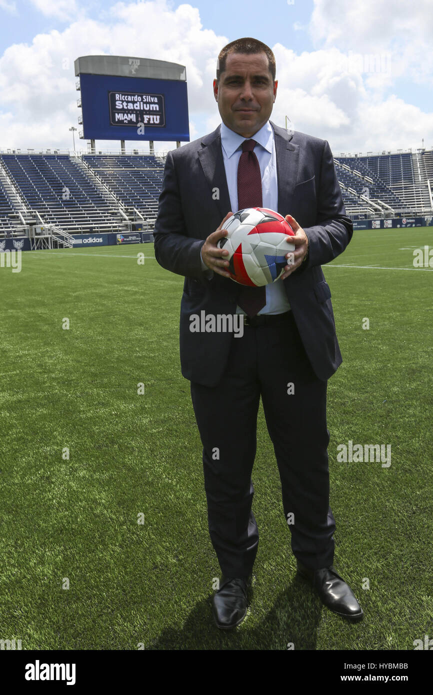 Riccardo Silva holds for a photo in Florida International University's ...