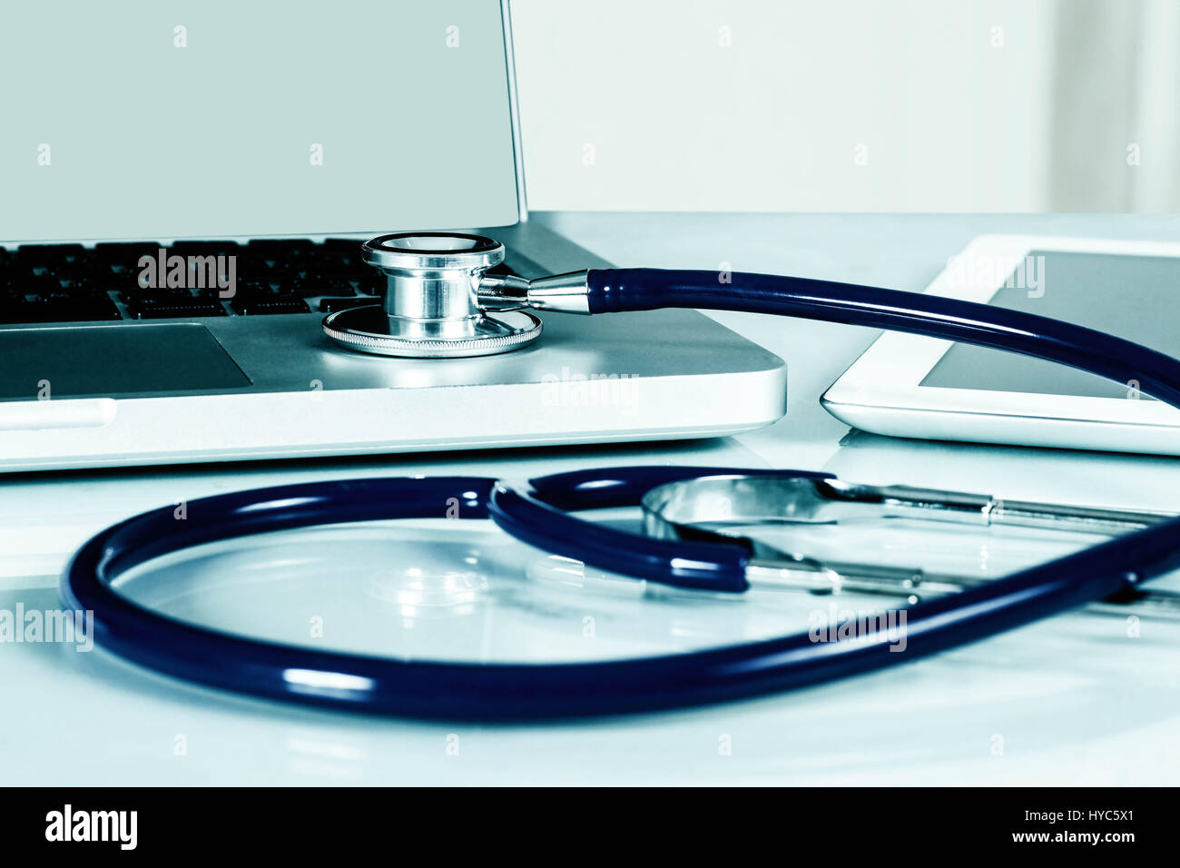 Stethoscope with computer and equipment on the desk Stock Photo - Alamy