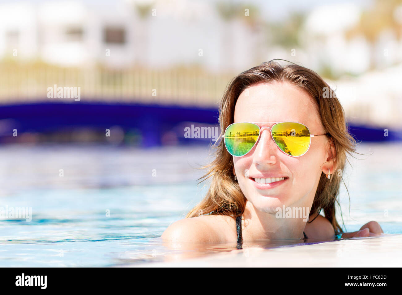 Lady enjoying pool hi-res stock photography and images - Alamy