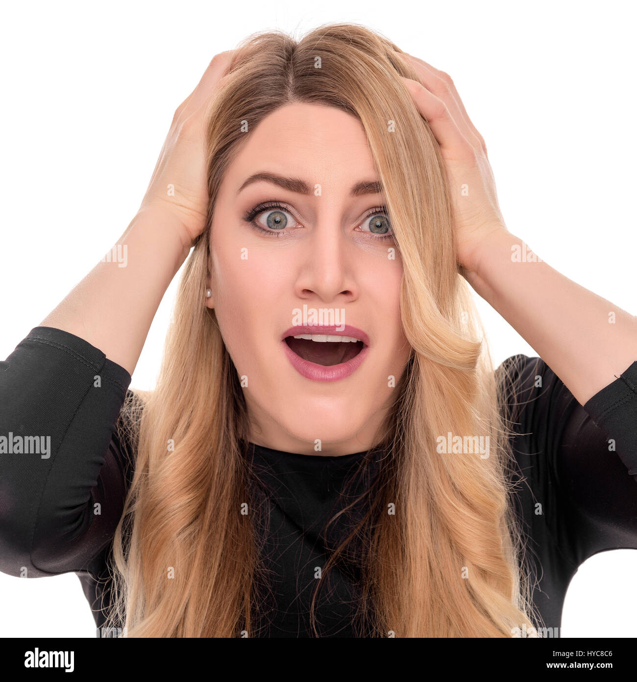 Surprised pretty young woman Stock Photo - Alamy