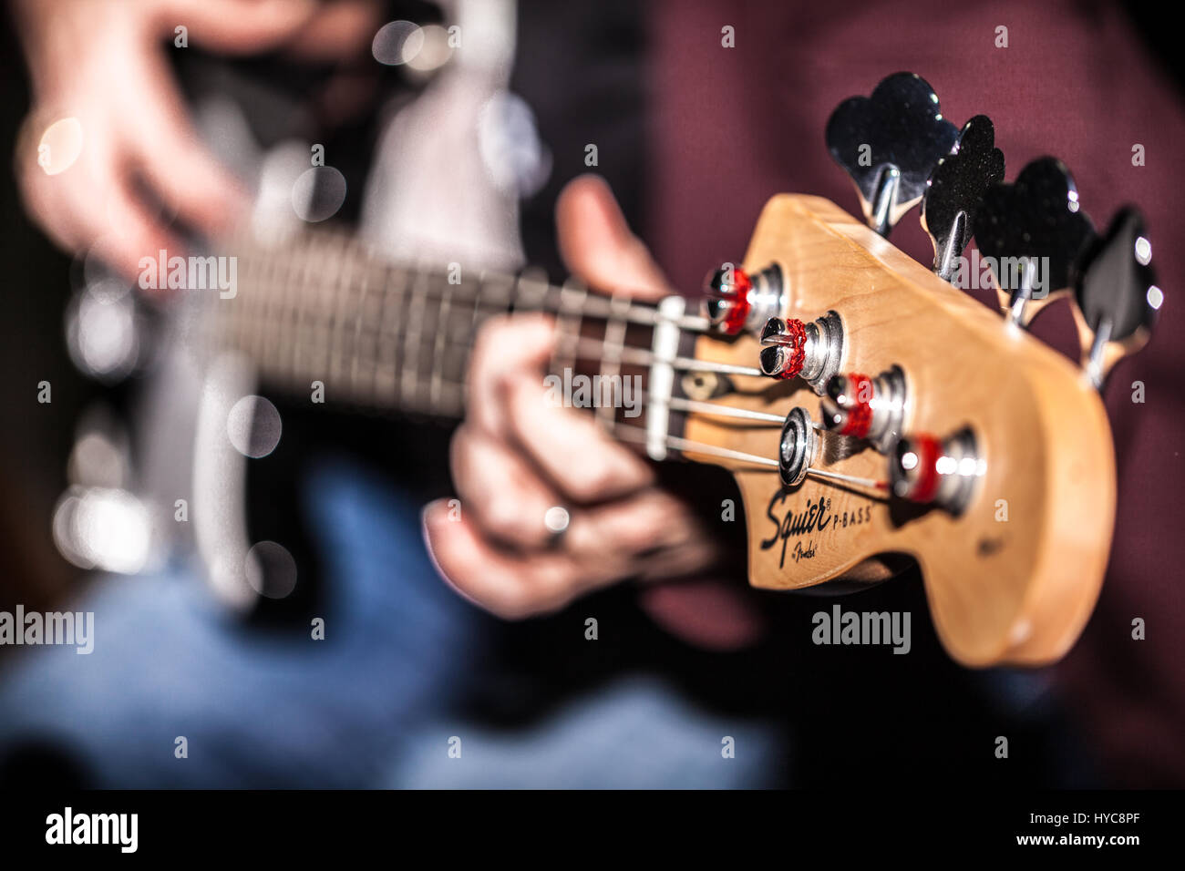 female musician playing the electric bass Stock Photo - Alamy