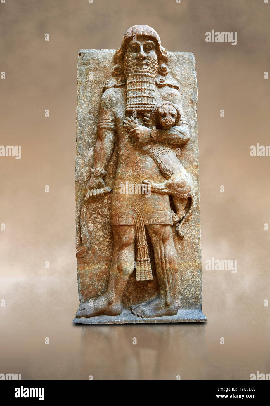 Stone statue of a Hero holding a lion. From facade M of the palace ...