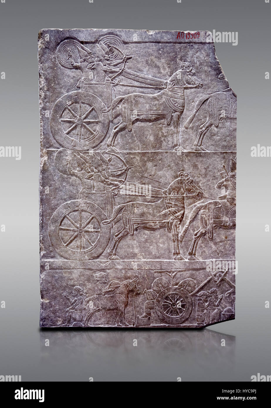Stone relief sculptured panel of aa Assyrian Chariot. From the palace ...