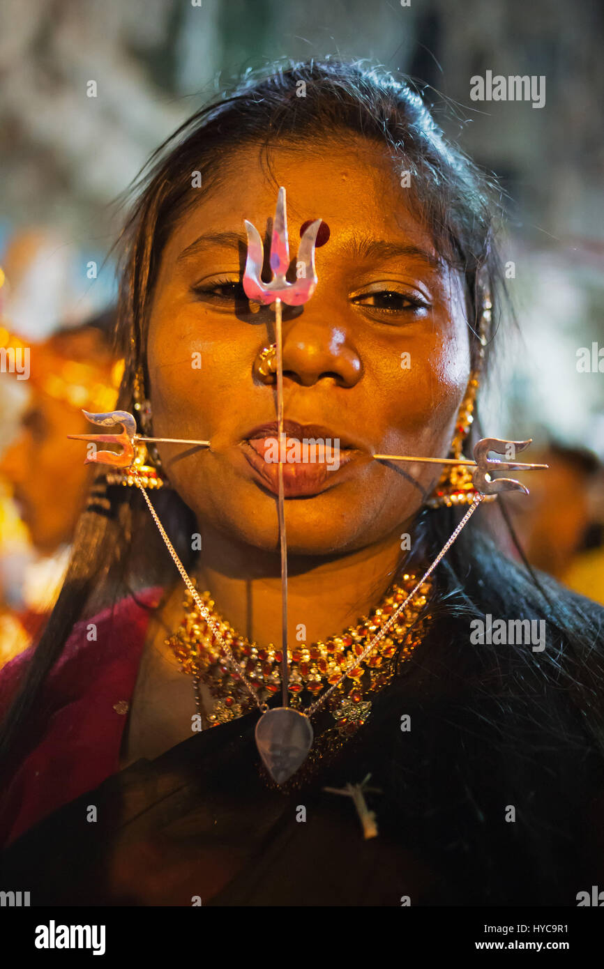 woman piercing at thaipusam festival, batu caves, kuala, lumpur ...