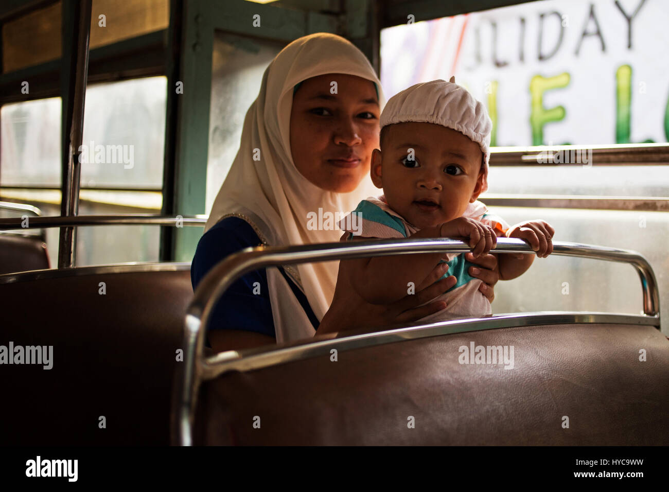 muslim mother with baby in bus, cameron highlands, malaysia Stock Photo ...