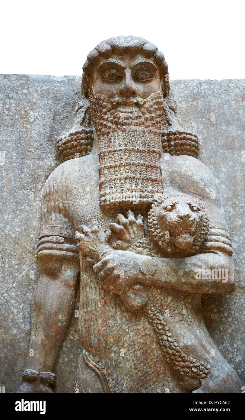 Stone relief sculptured panel of a Hero holding a lion. From the facade ...