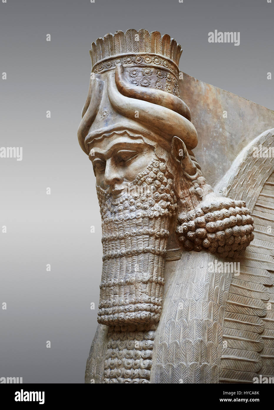 Stone statue of a winged bull. Reproduction from the facade of the ...