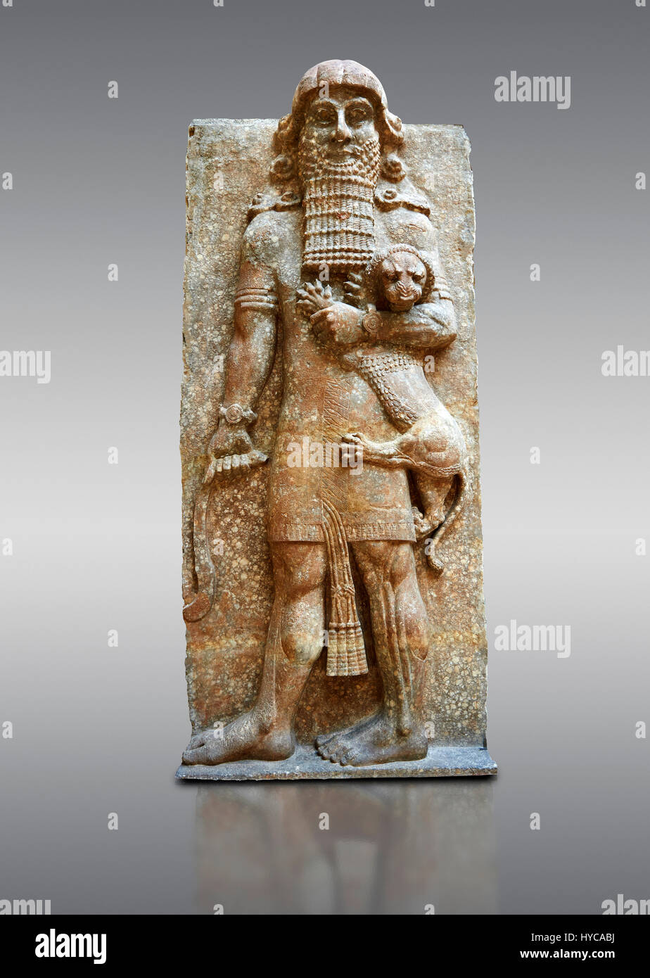 Stone statue of a Hero holding a lion. From facade M of the palace ...