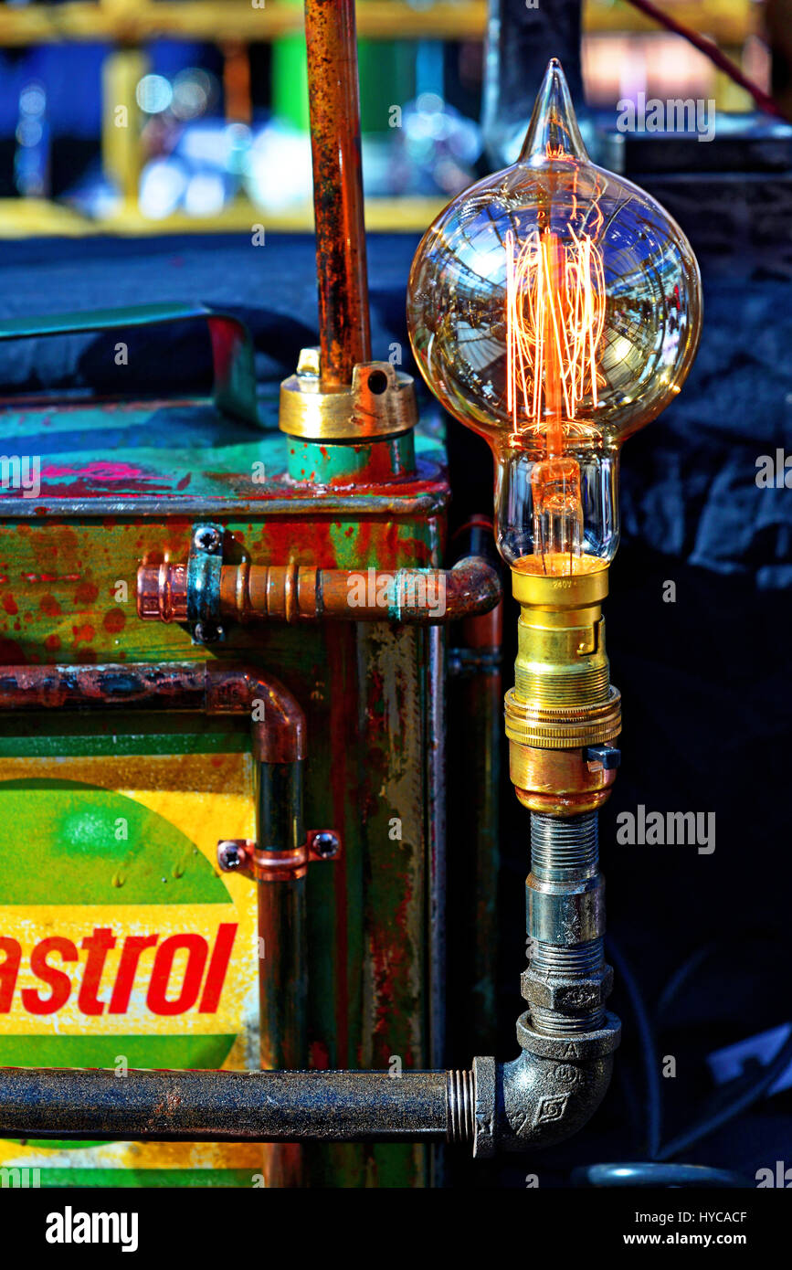 Unusual copper electric light bulb attachment Stock Photo - Alamy