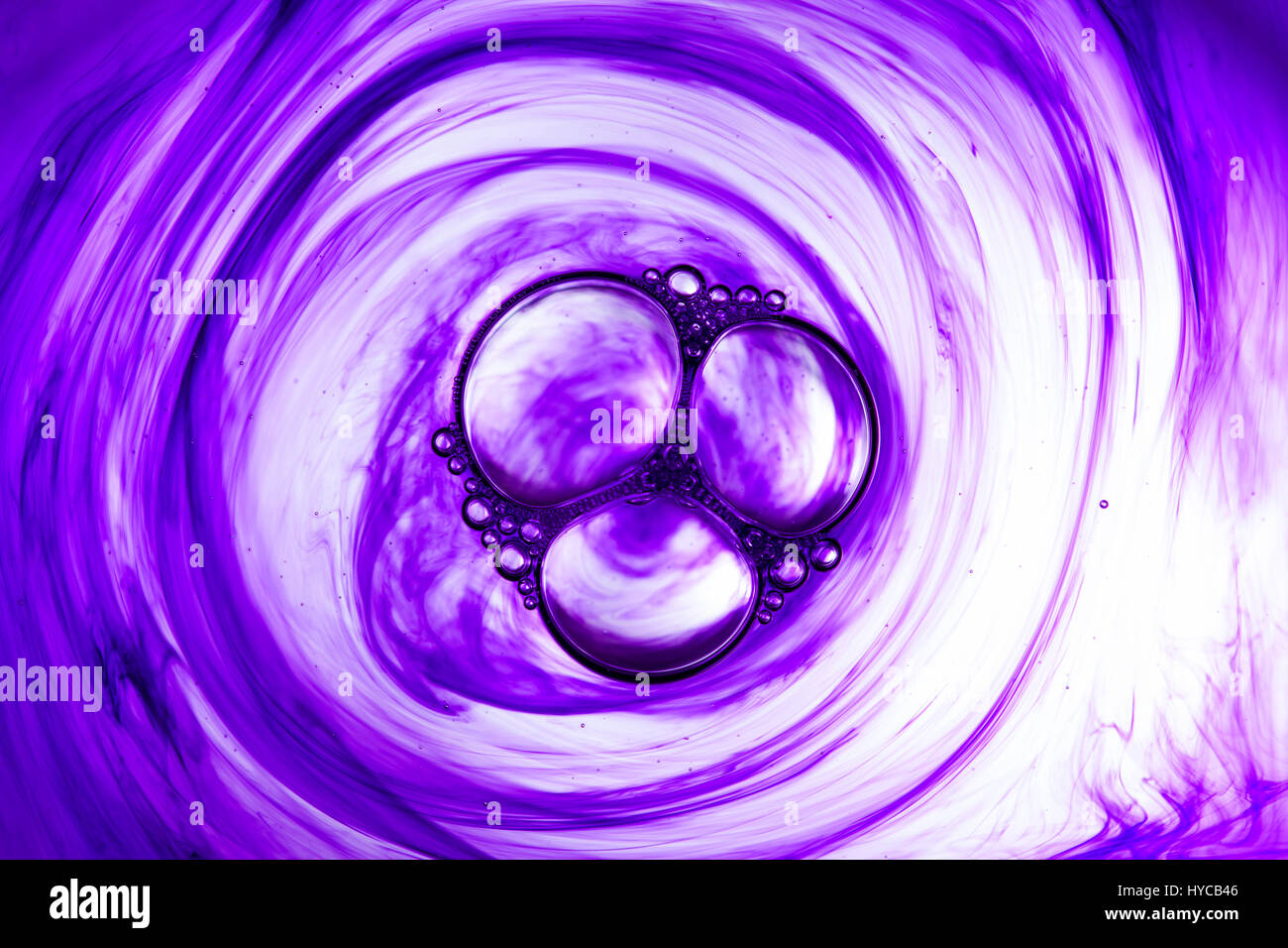 moving ink in water spiral abstract Stock Photo - Alamy