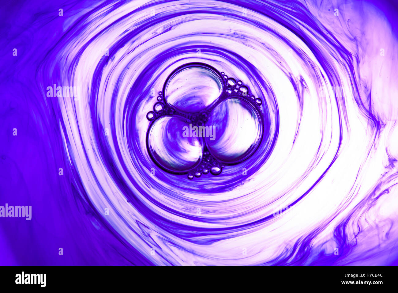 moving ink in water spiral abstract Stock Photo - Alamy