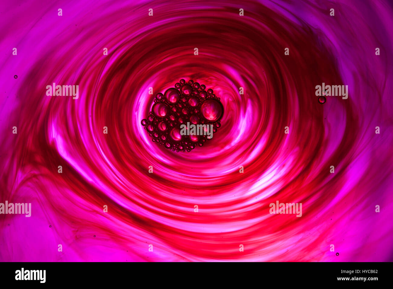 moving ink in water spiral abstract Stock Photo - Alamy