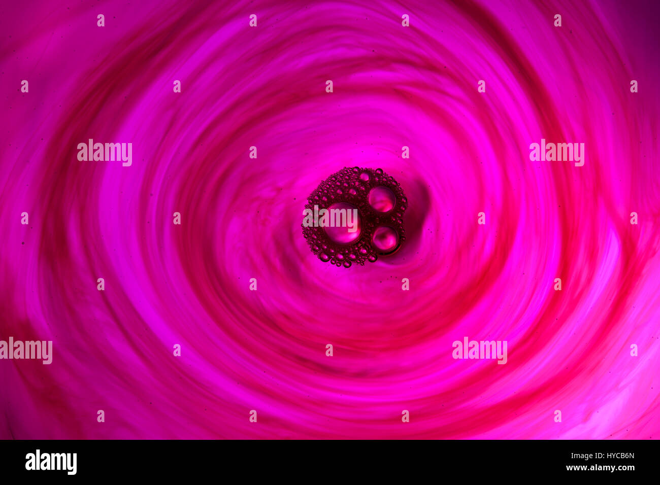moving ink in water spiral abstract Stock Photo - Alamy