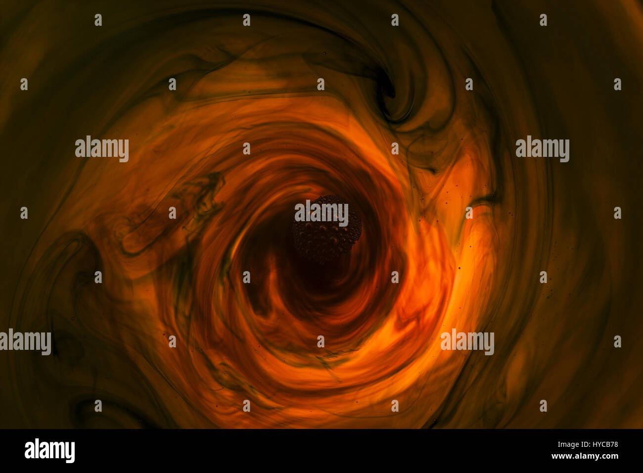 moving ink in water spiral abstract Stock Photo - Alamy