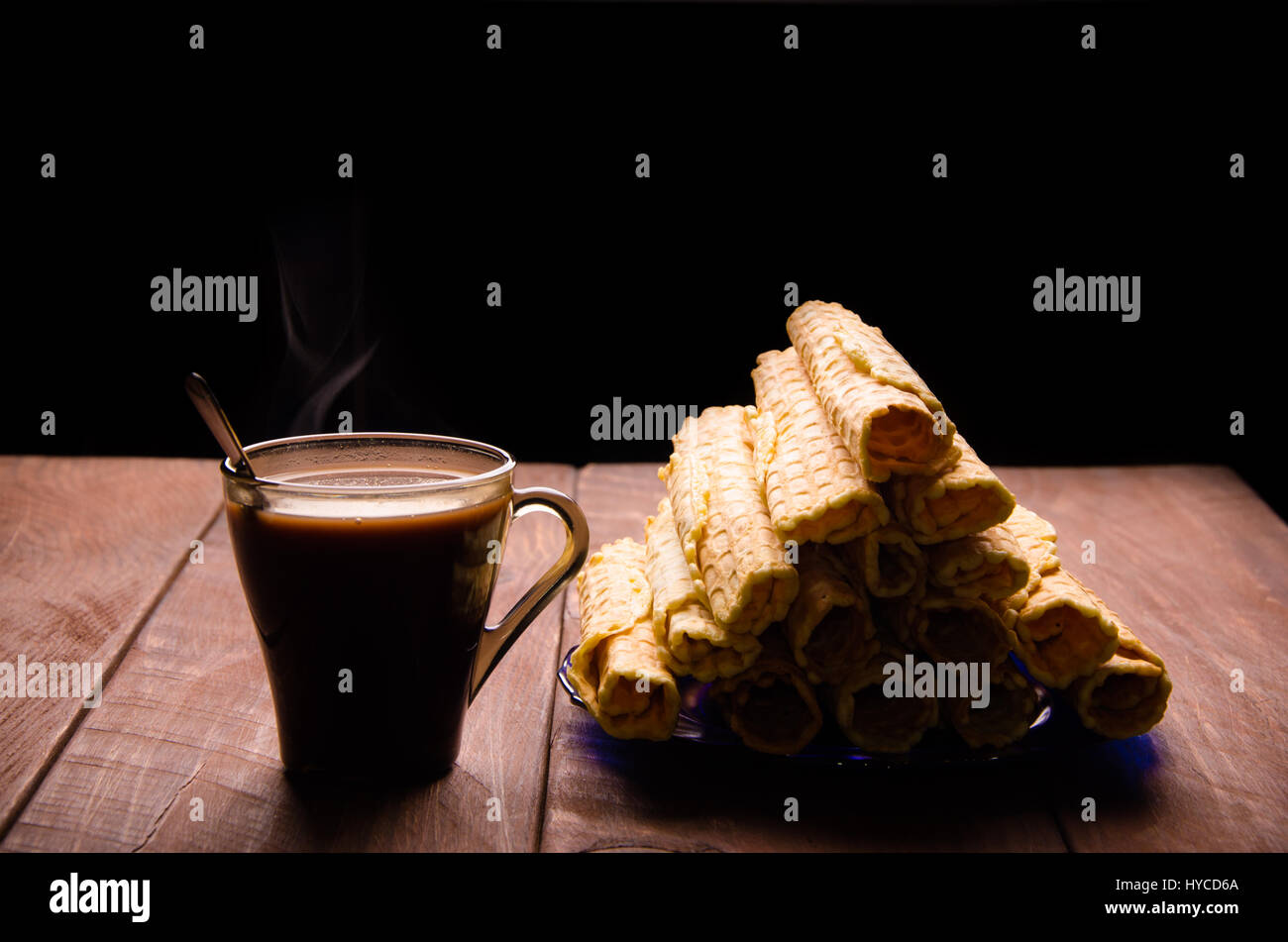 tubular wafer. hot chocolate. waffles on wooden boards Stock Photo - Alamy