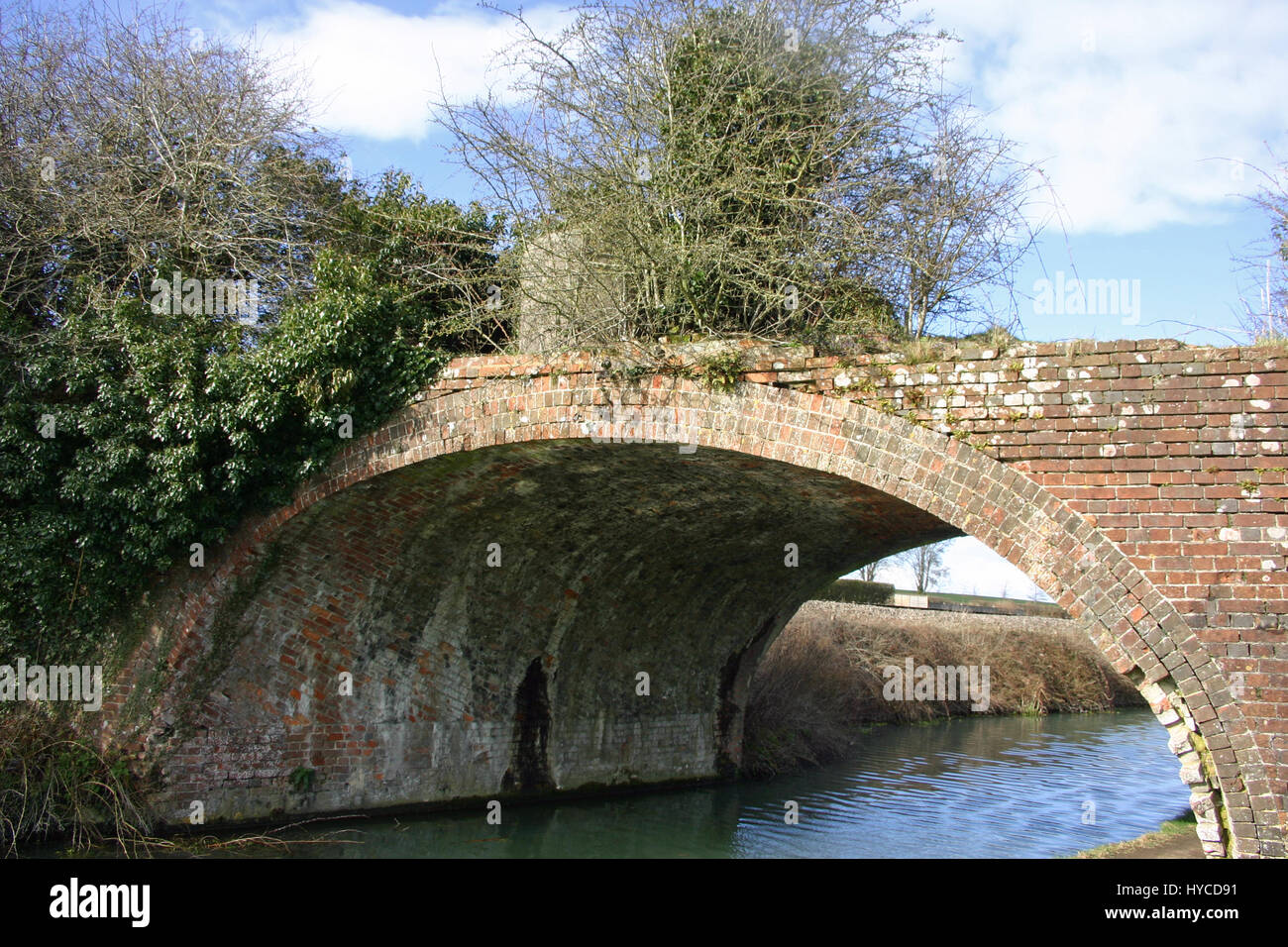 Brick built bridge over the Kennet and Avon Canal in Wiltshire with a ...