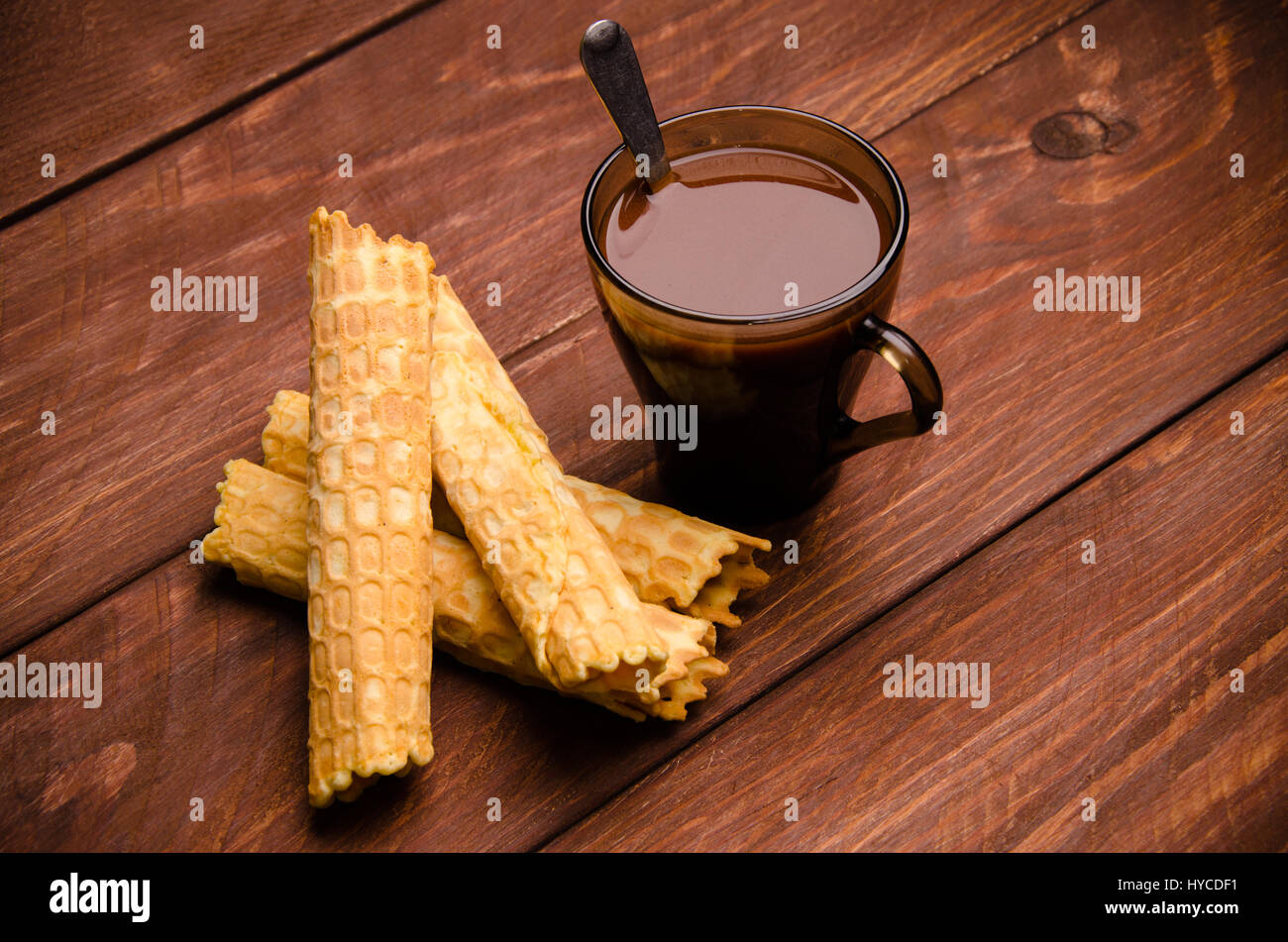 tubular wafer. hot chocolate. waffles on wooden boards Stock Photo - Alamy