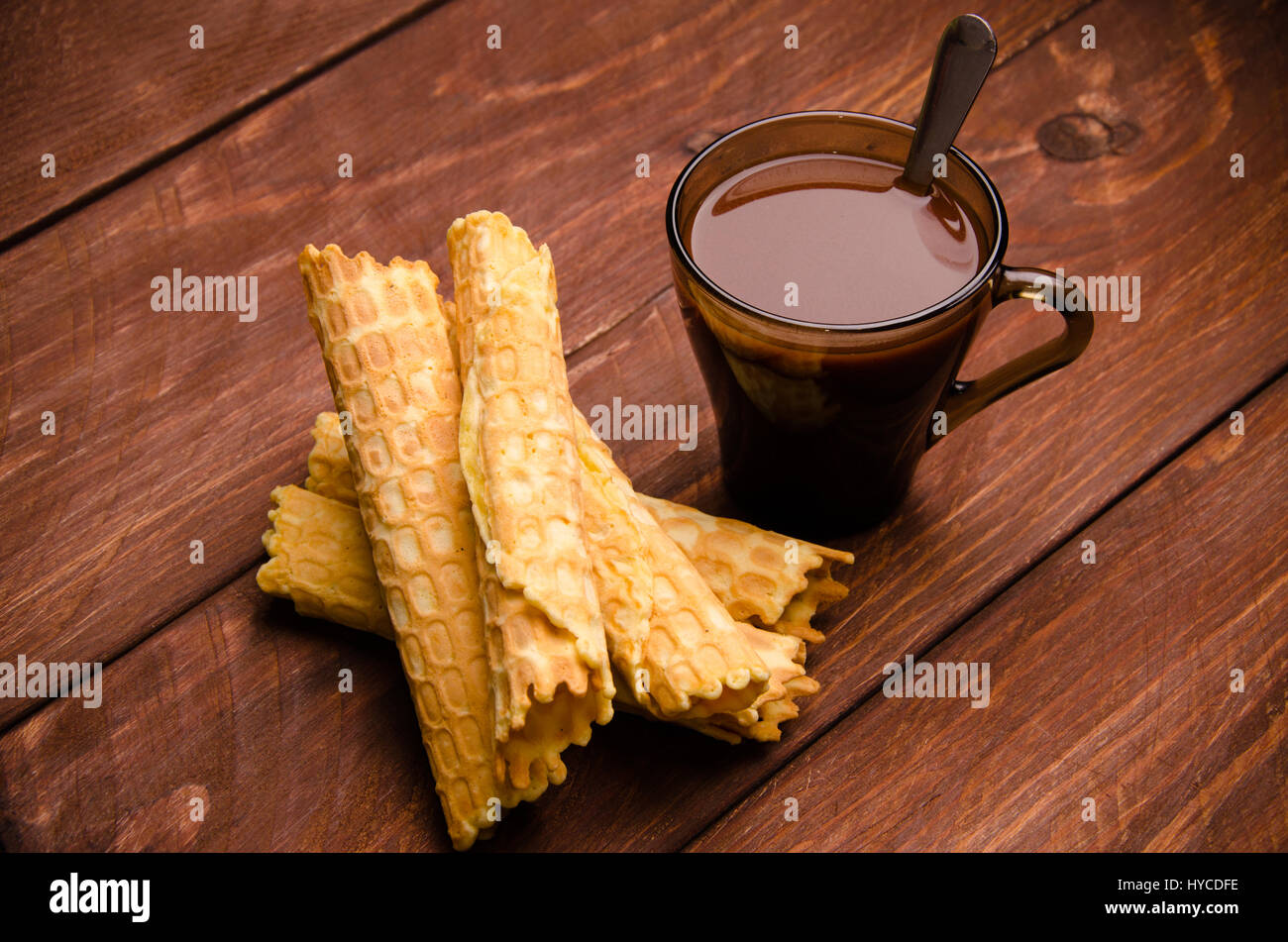tubular wafer. hot chocolate. waffles on wooden boards Stock Photo - Alamy
