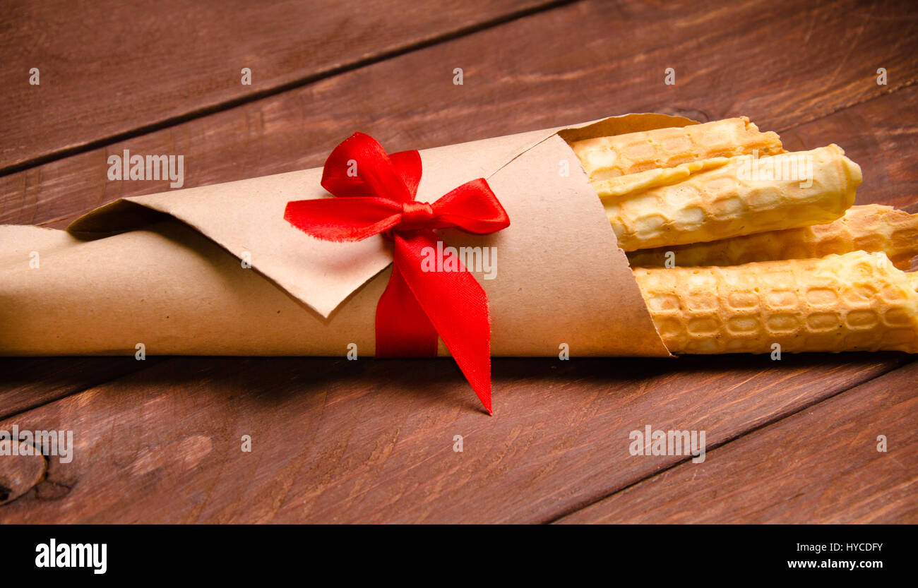 tubular wafer. waffles on wooden boards. a bouquet of waffles Stock ...