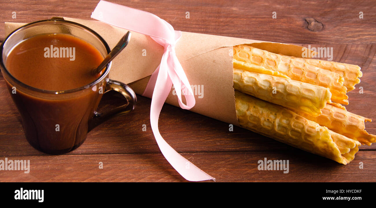 tubular wafer. waffles on wooden boards. a bouquet of waffles Stock ...