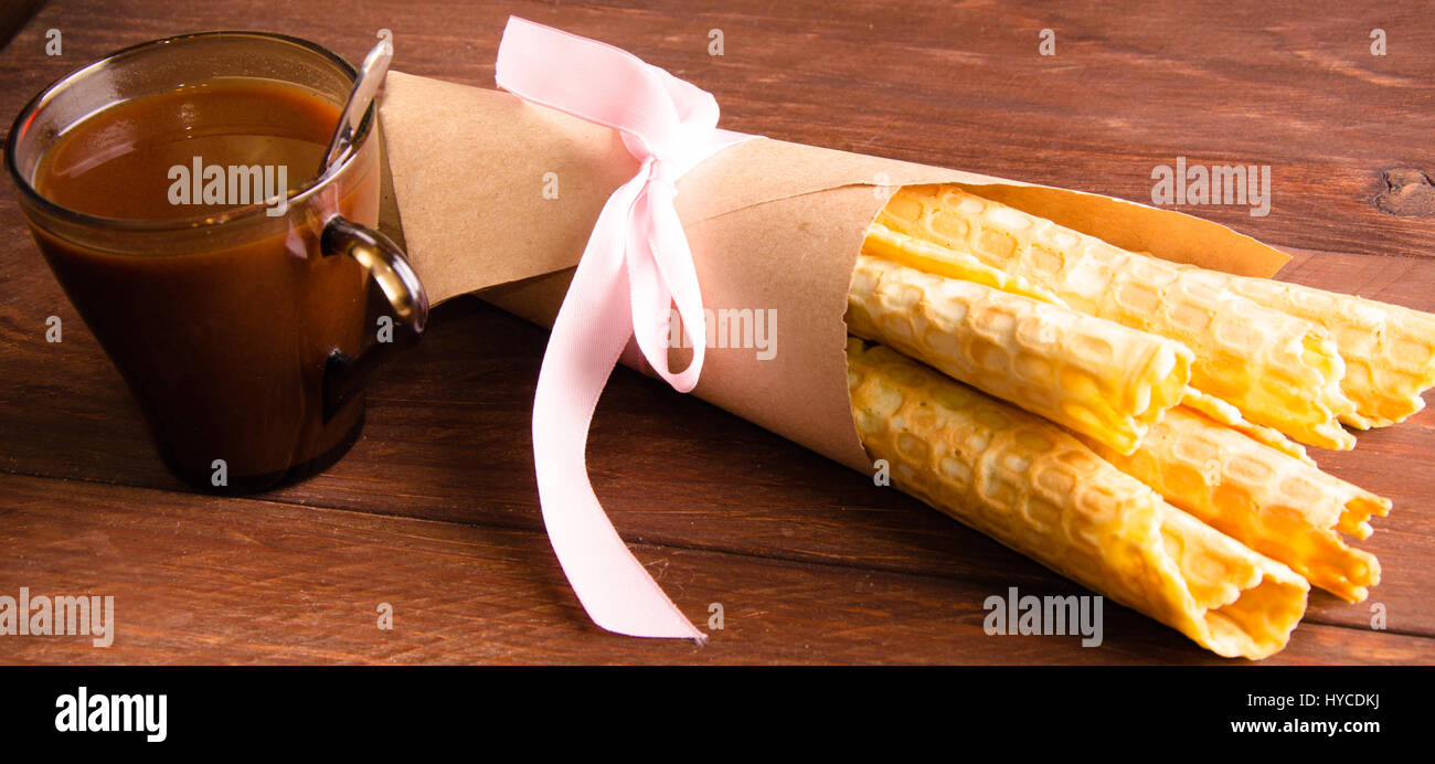tubular wafer. waffles on wooden boards. a bouquet of waffles Stock ...