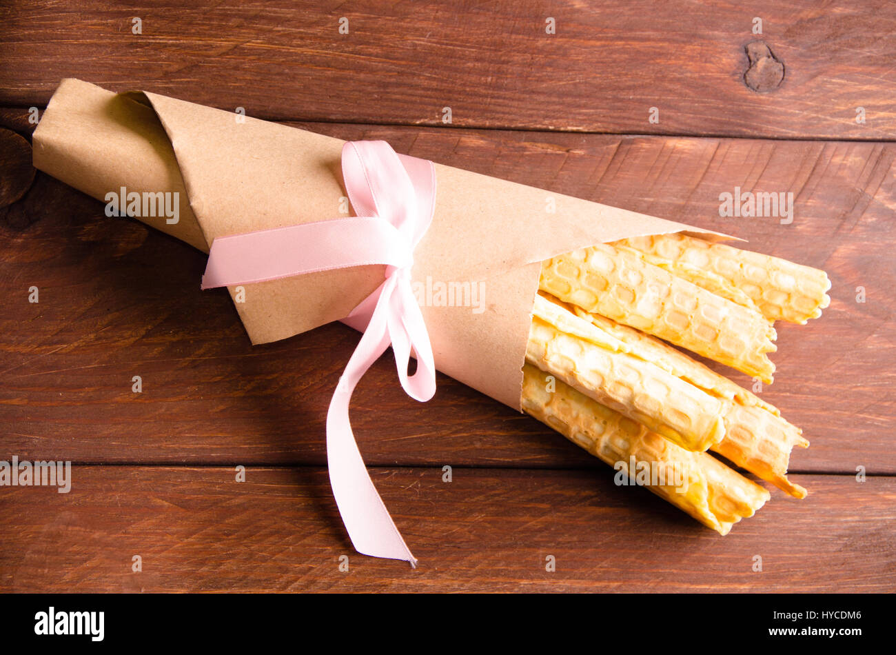 tubular wafer. waffles on wooden boards. a bouquet of waffles Stock ...