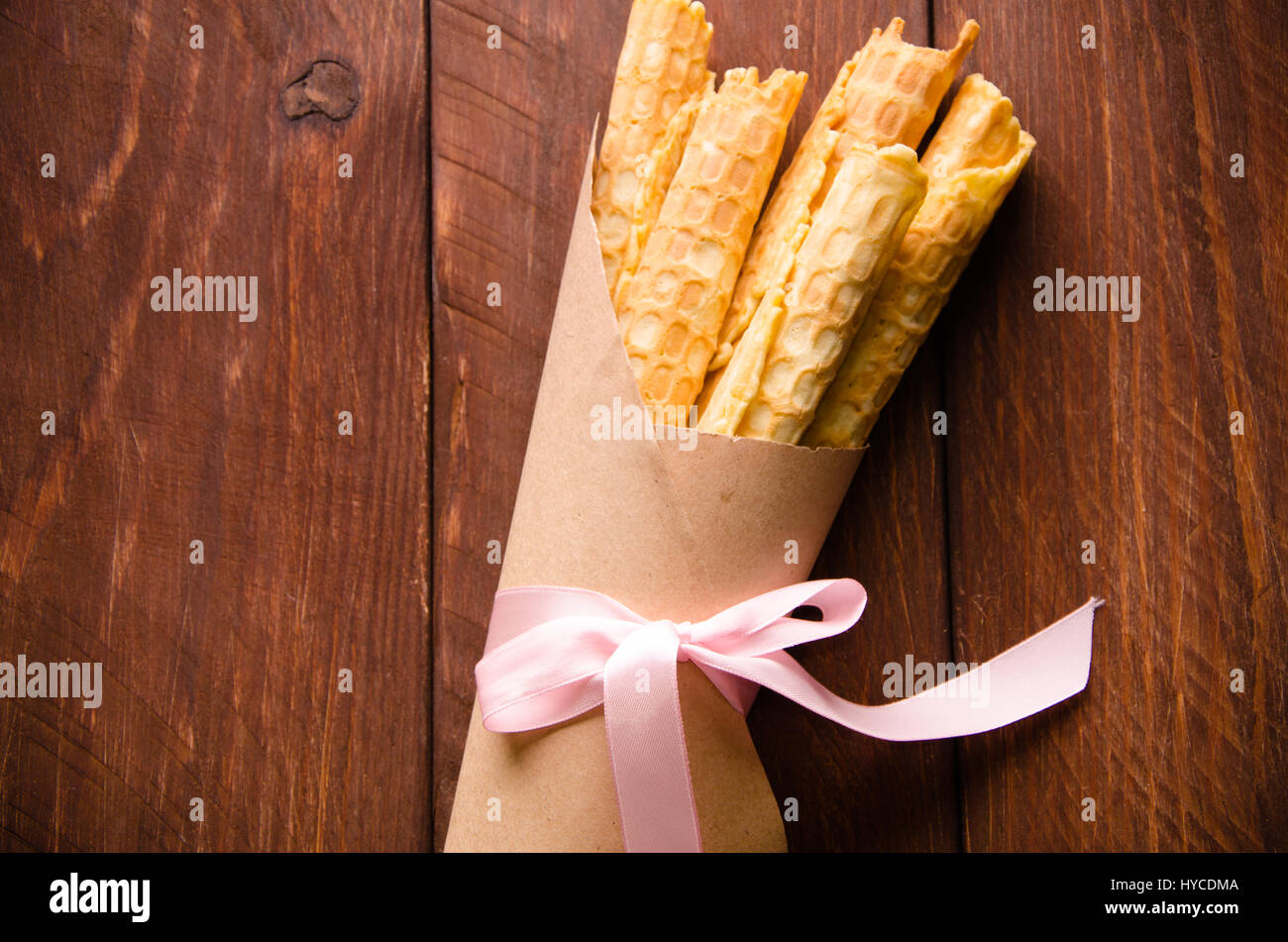 tubular wafer. waffles on wooden boards. a bouquet of waffles Stock ...