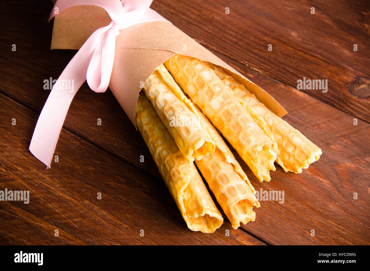 tubular wafer. waffles on wooden boards. a bouquet of waffles Stock ...