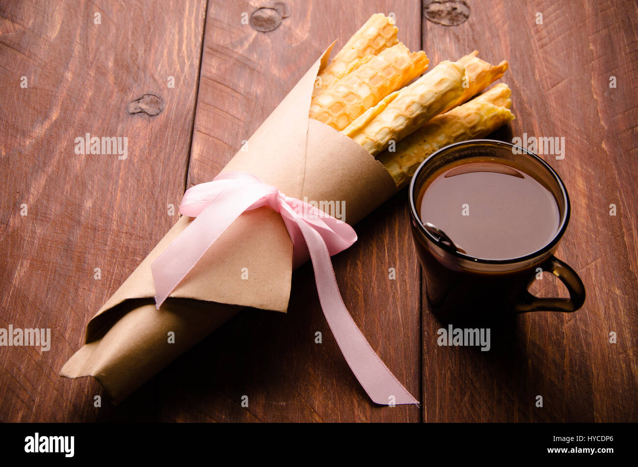 tubular wafer. waffles on wooden boards. a bouquet of waffles Stock ...
