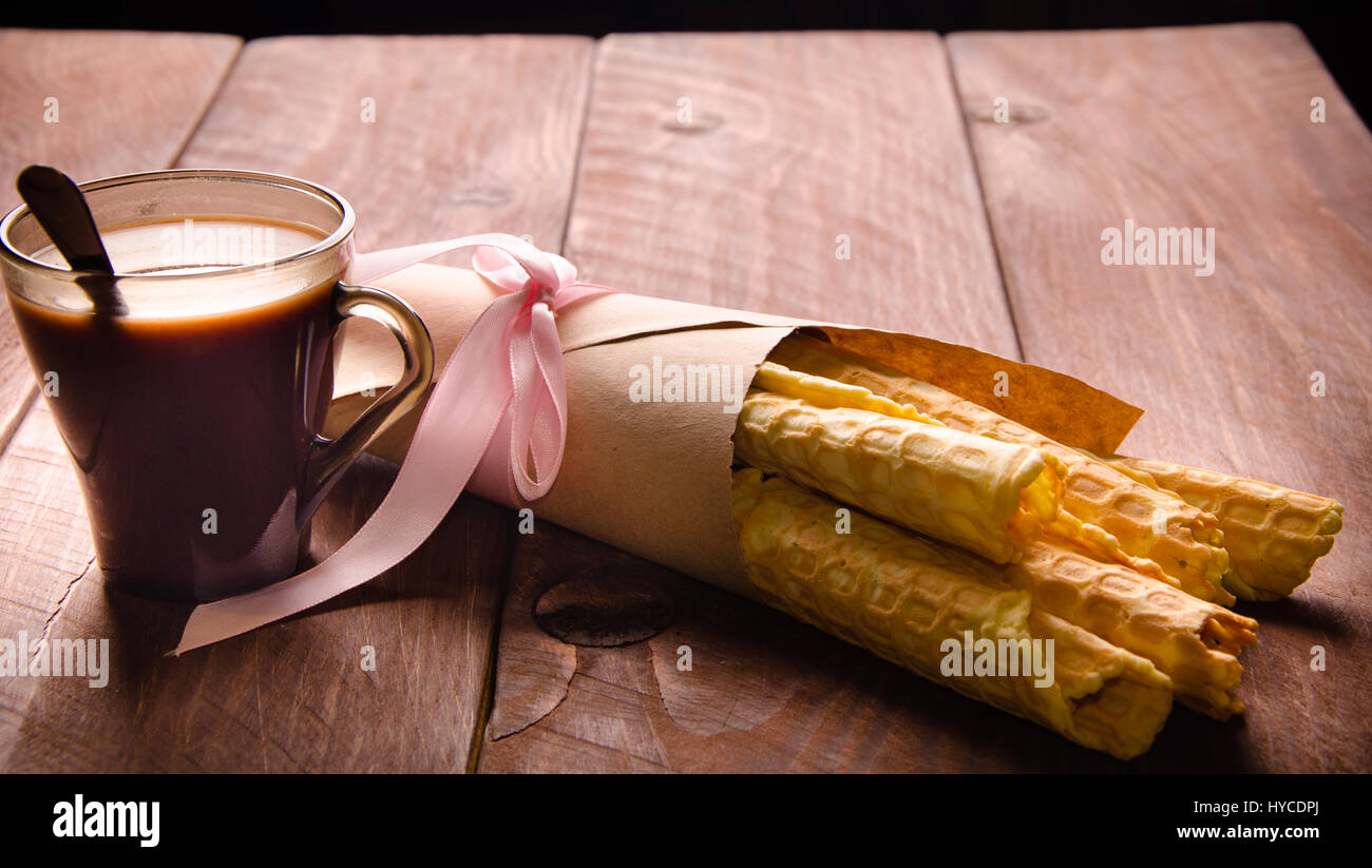 tubular wafer. waffles on wooden boards. a bouquet of waffles Stock ...