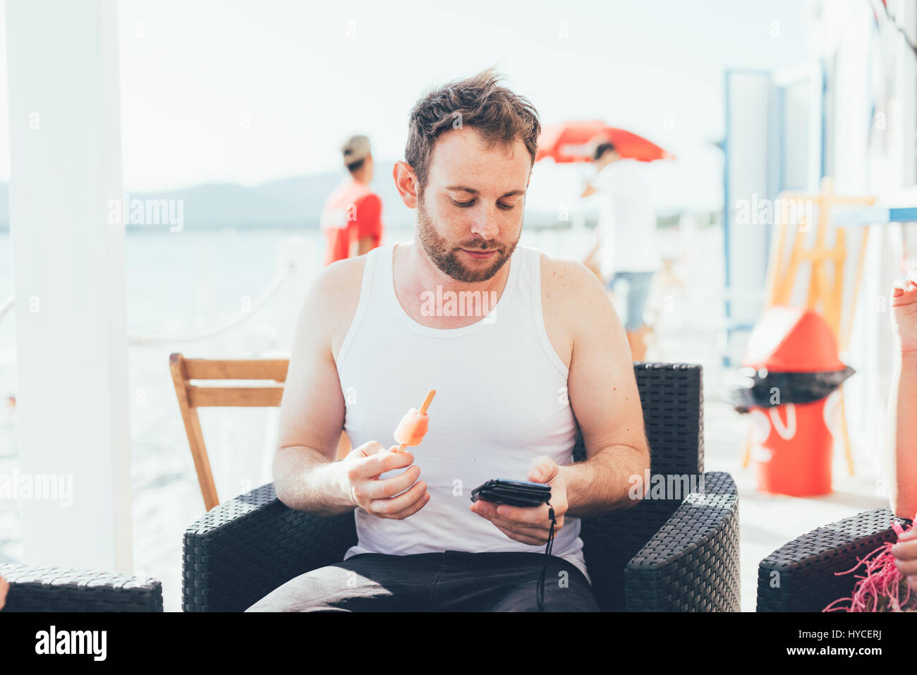 Eating popsicle adult hi-res stock photography and images - Alamy