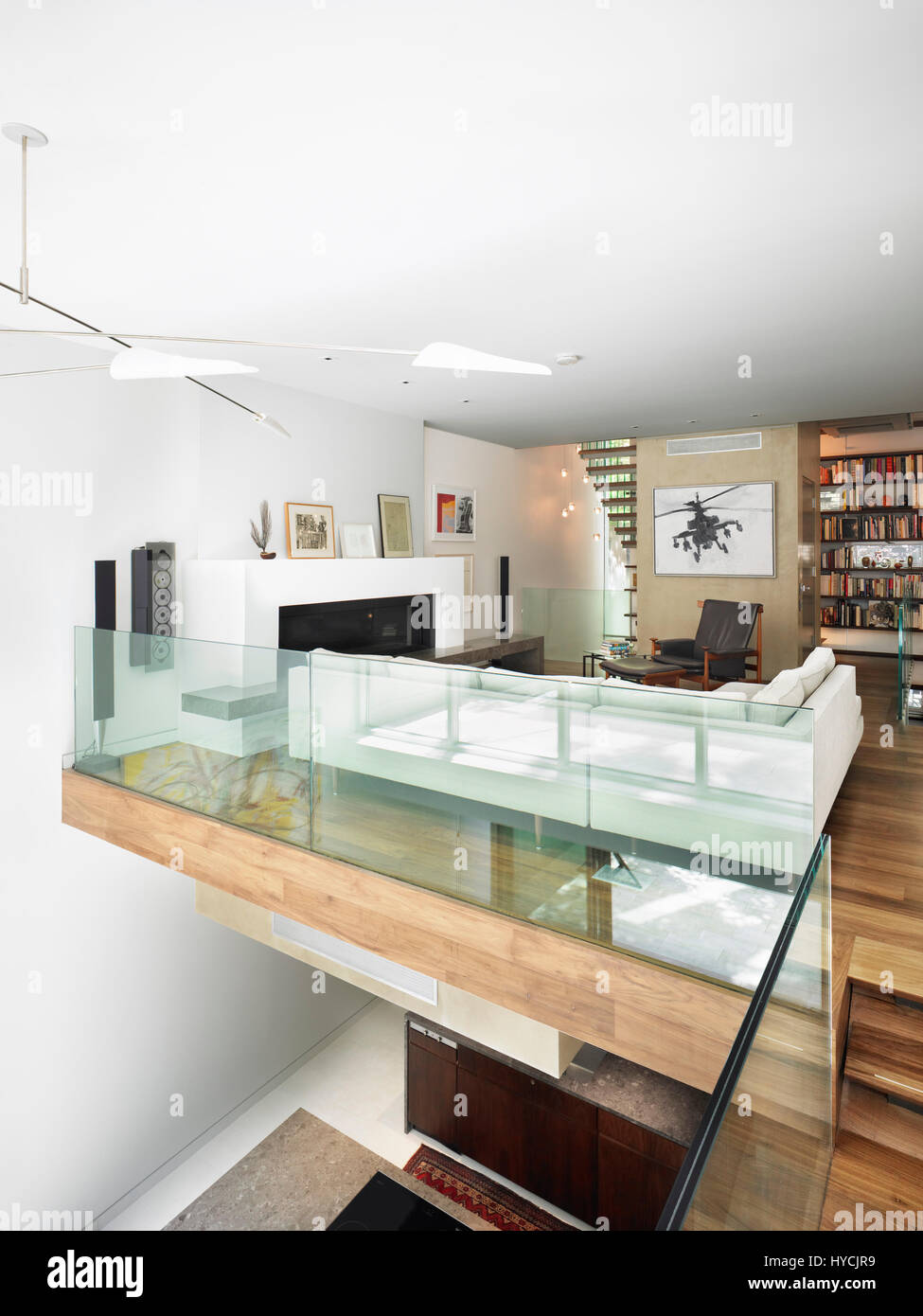 View of the open living room and the double height dining room below ...