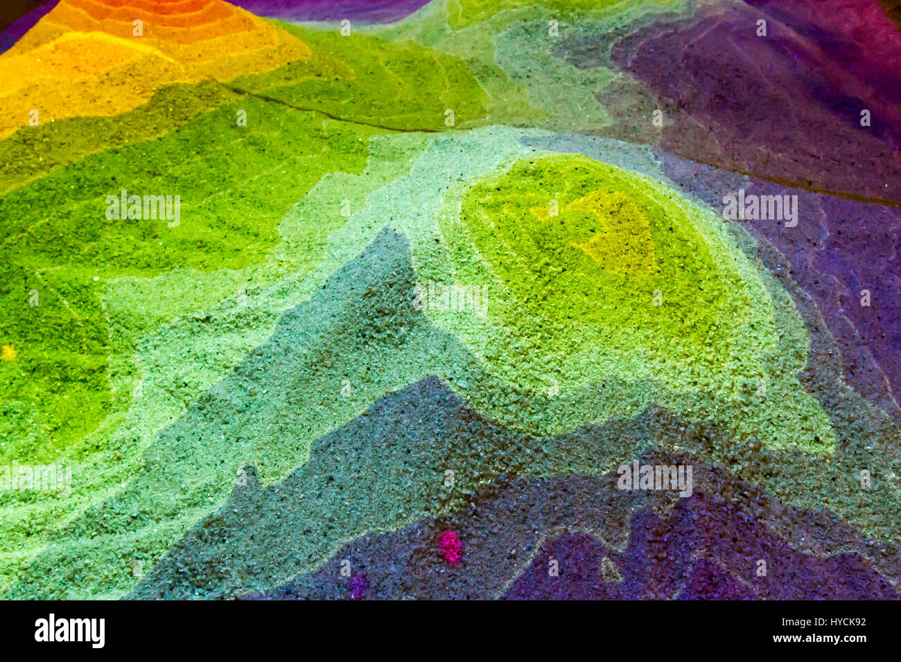 Diagram of mountain topography illustrated using grains of colored sand ...