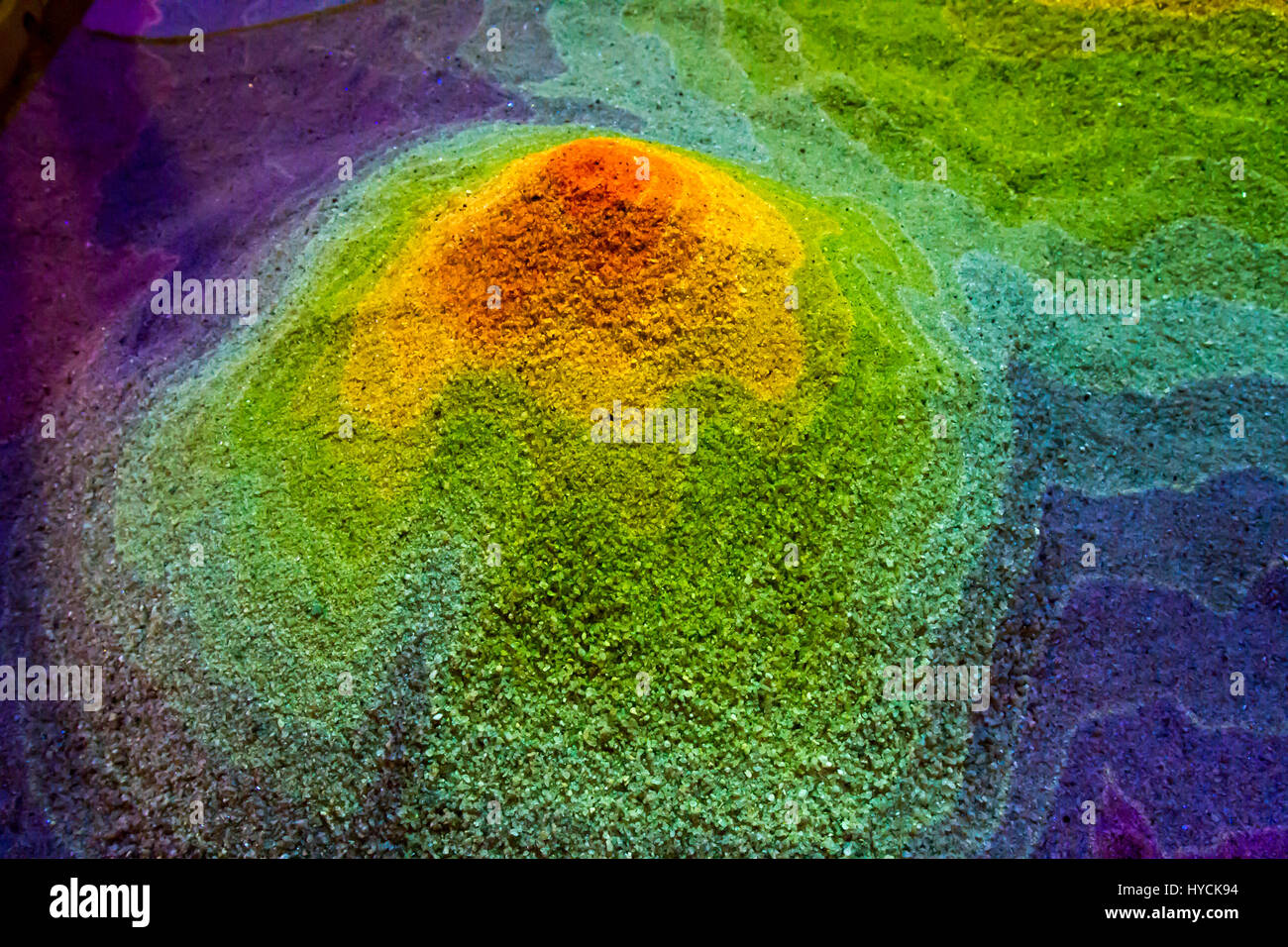 Diagram of mountain topography illustrated using grains of colored sand ...