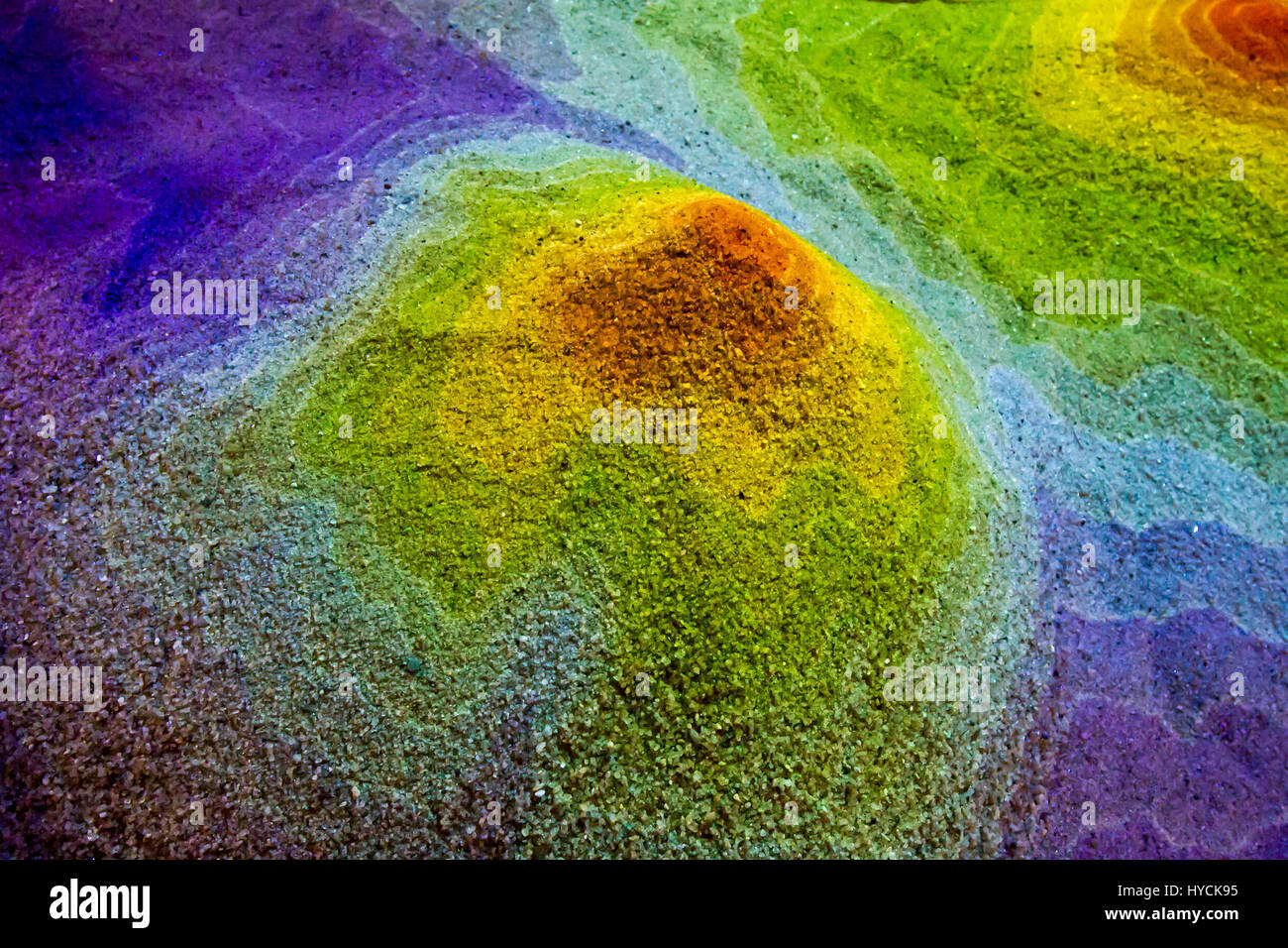 Diagram of mountain topography illustrated using grains of colored sand ...
