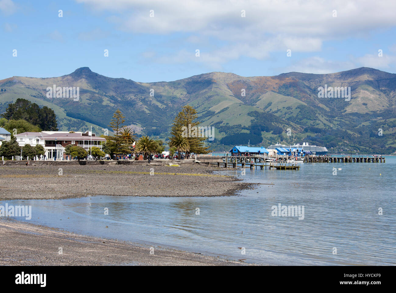The view of Akaroa resort town beach by French Bay (New Zealand Stock ...