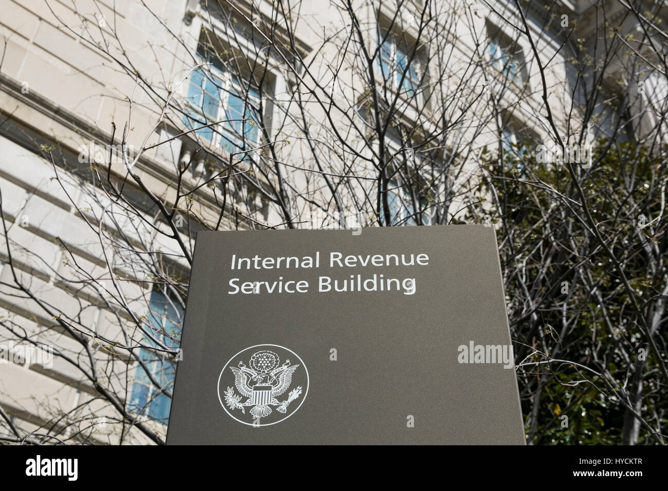 A logo sign outside of the headquarters of the Internal Revenue Service ...