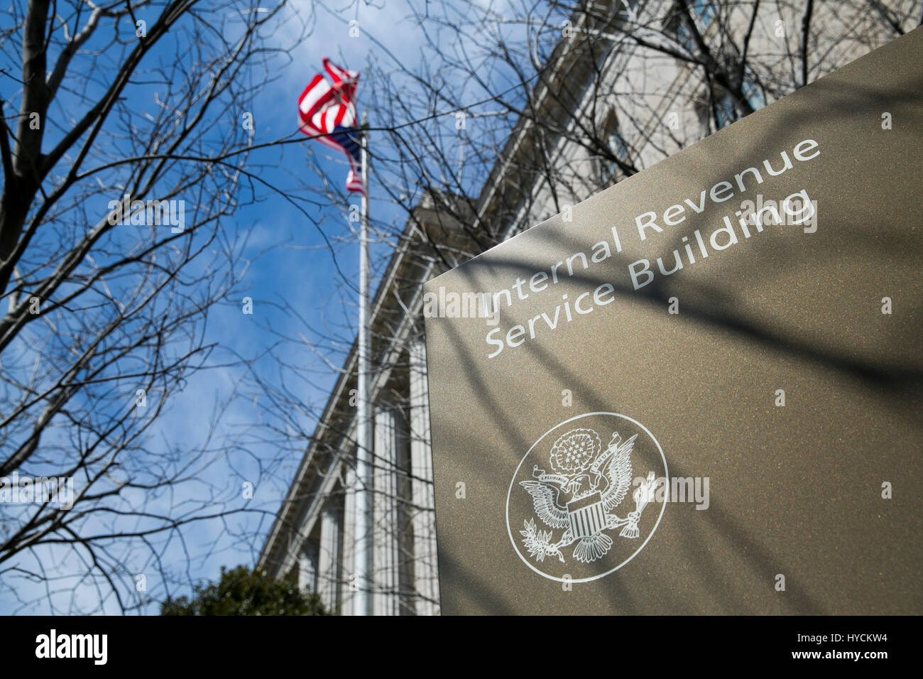A logo sign outside of the headquarters of the Internal Revenue Service ...