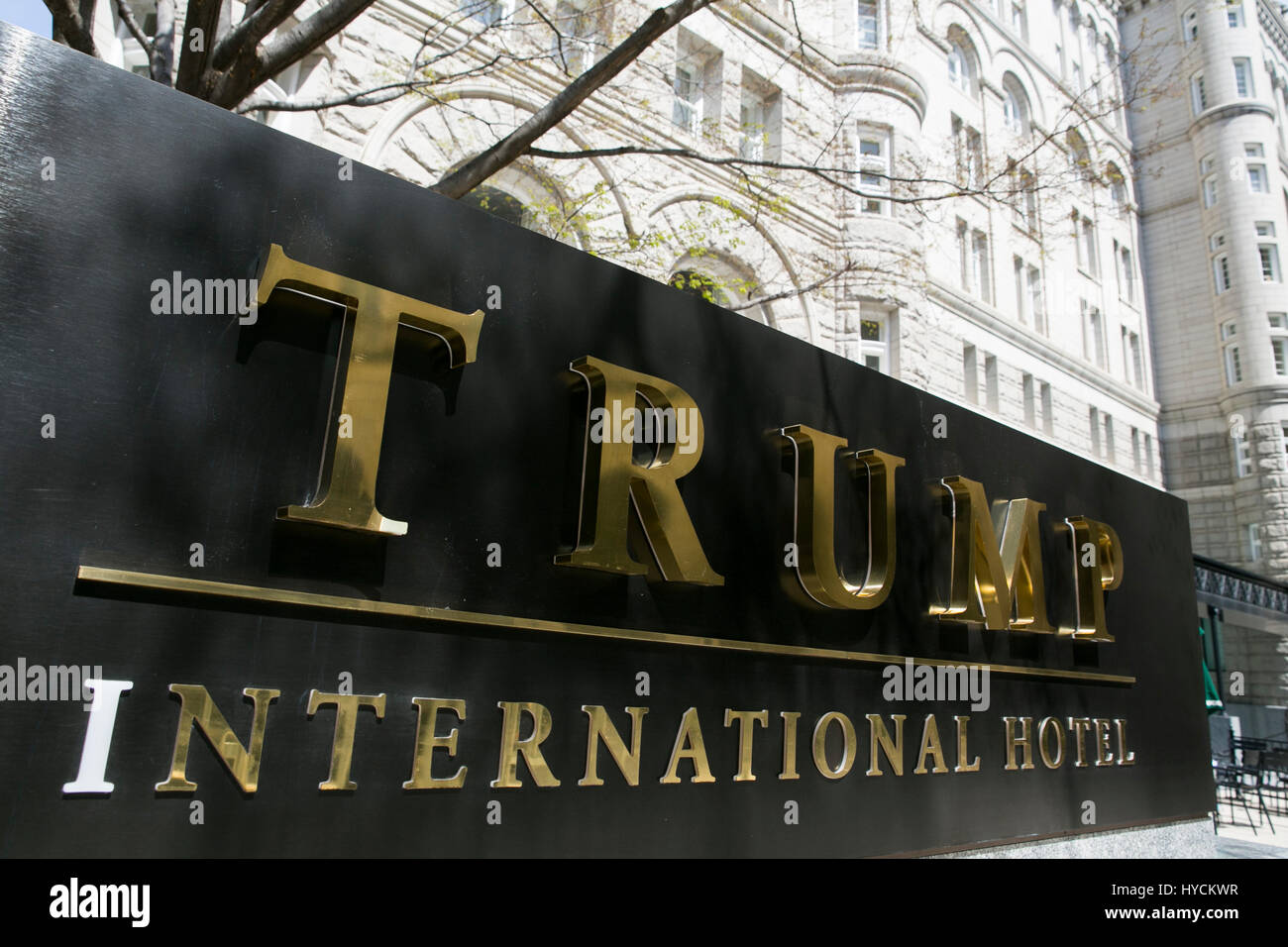 A logo sign outside of the Trump International Hotel in the Old Post ...