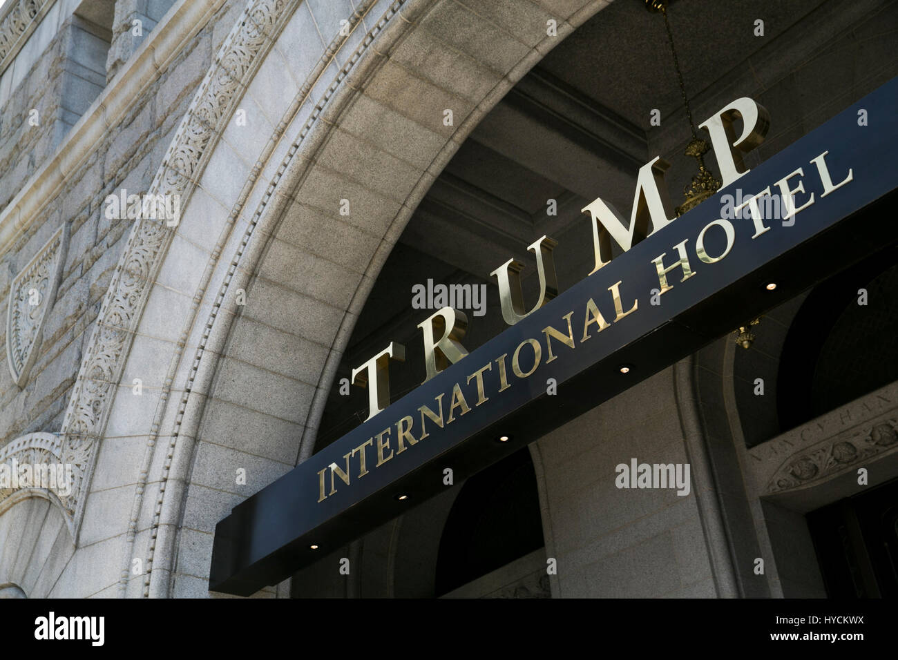 A logo sign outside of the Trump International Hotel in the Old Post ...